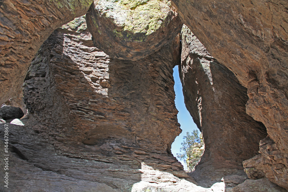 Echo Canyon rock grotto cave like formation at the base of hoodoos in Chiricahua National ...
