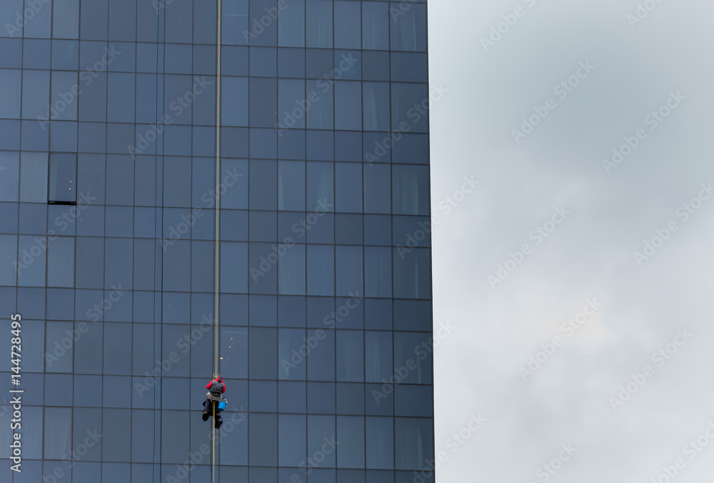cleaning skyscrapers outside with a crane scissor lift hydraulic ...