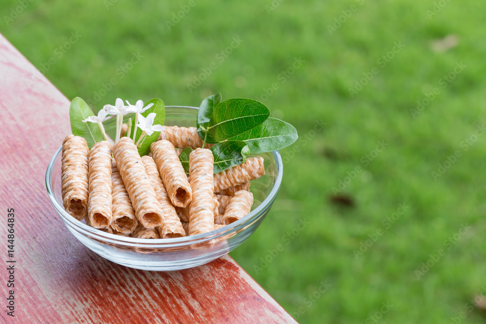 Crispy rolled wafer sticks, traditional dessert in Thailand, are ...
