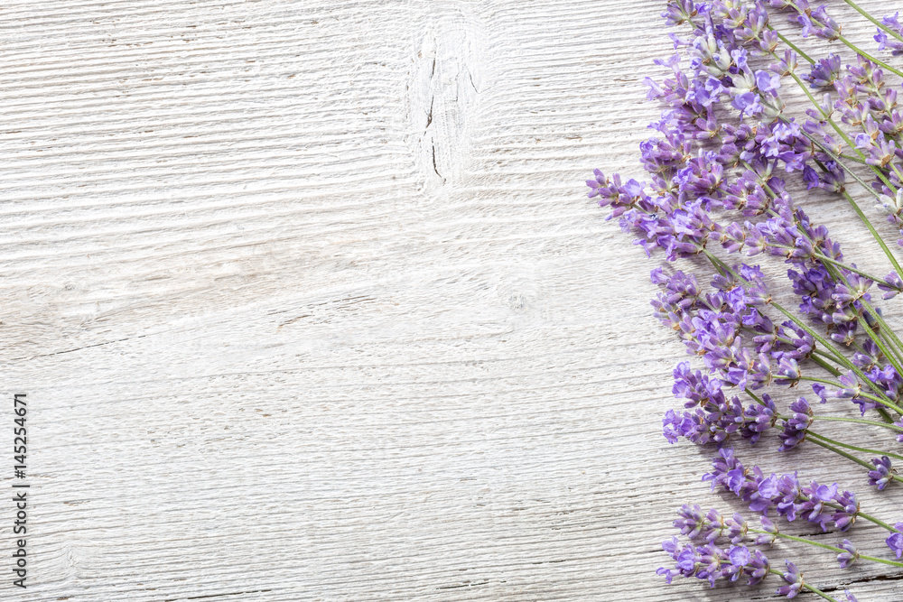 Sprigs of lavender on wooden background Stock Photo | Adobe Stock
