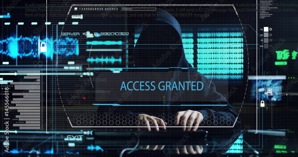 Hacker tries to enter the system using codes and numbers to find out the security password.The ...