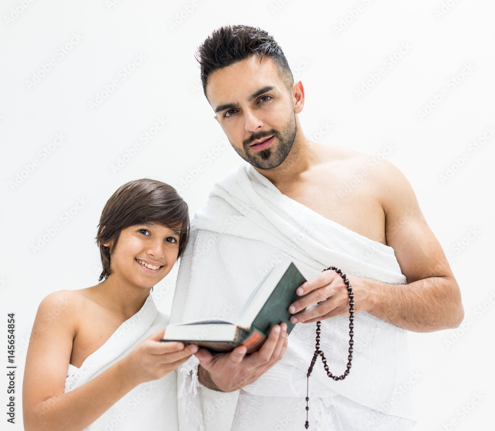 Muslim man posing as ready for Hajj visiting Kaaba in Mecca Stock Photo ...