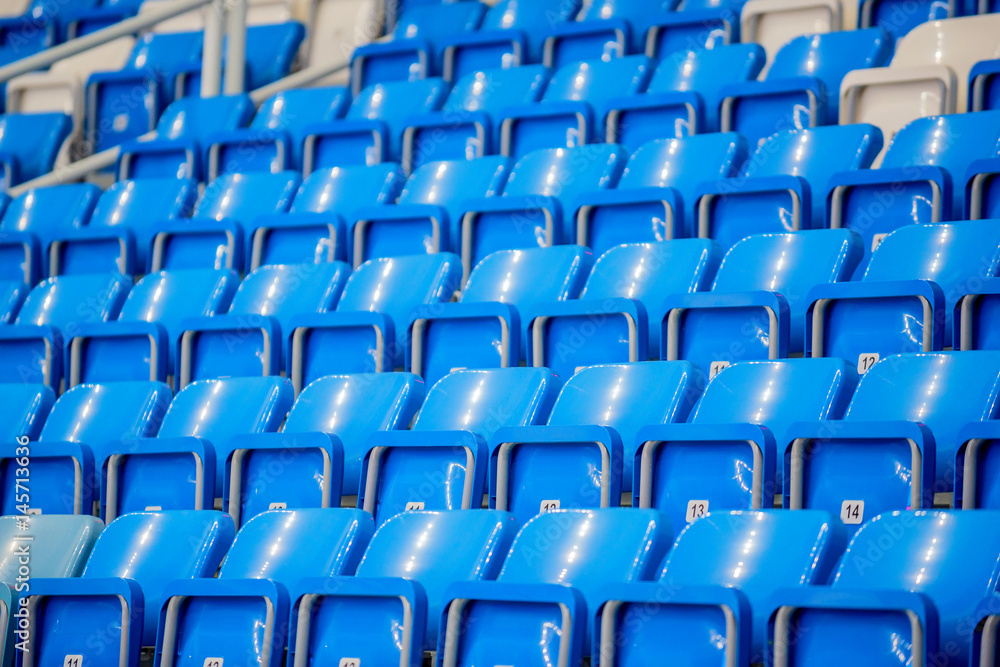 Bright blue and white stadium seat Stock Photo | Adobe Stock