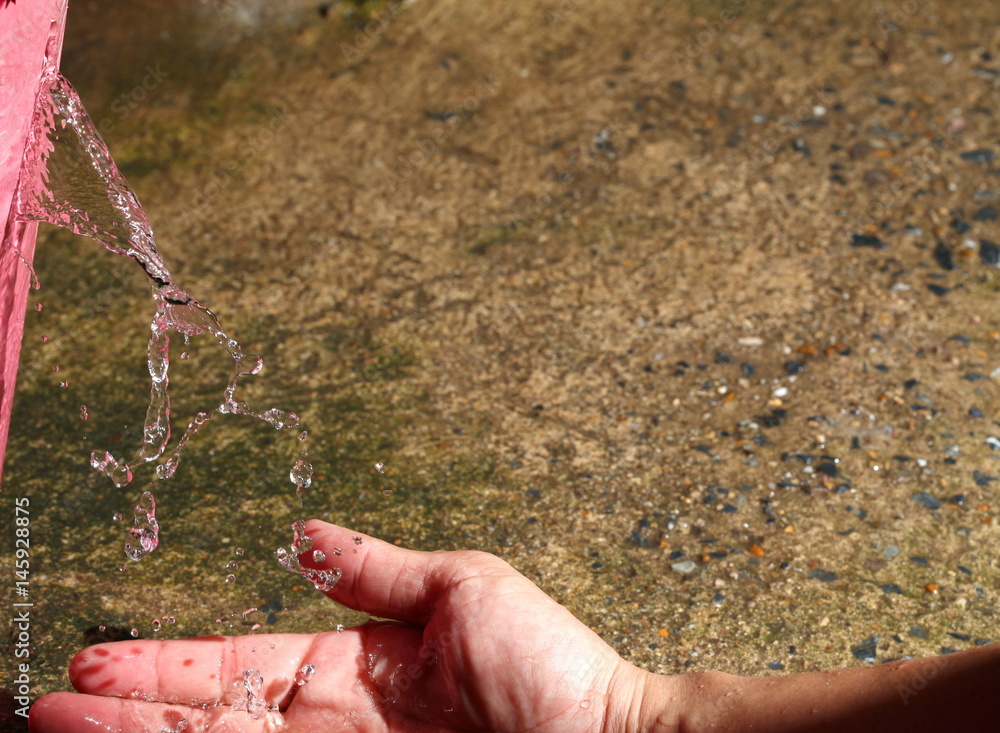 Water leaking from damaged broken plastic bucket that make the water ...