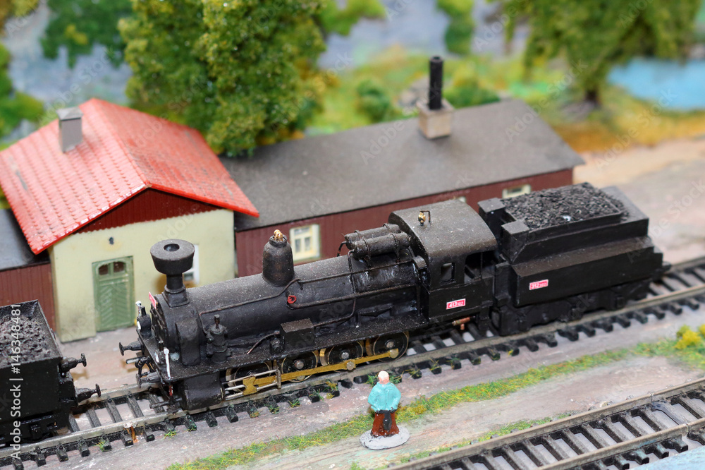 Miniature railway train station model with steam train. Handmade ...