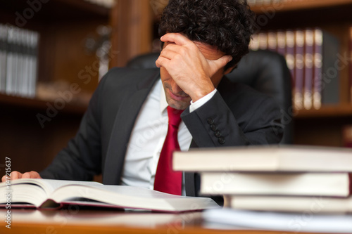 Stressed lawyer in his studio Stock Photo | Adobe Stock