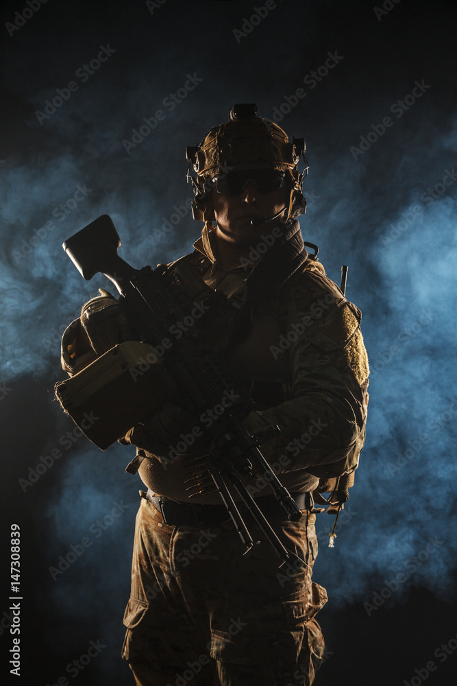 Army soldier in Combat Uniforms with machine gun, plate carrier and ...