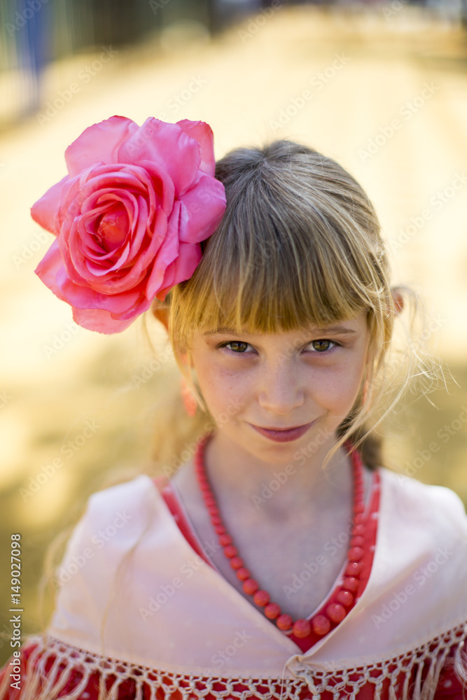 Photo Stock Adorable Little Spanish girl in traditional dress at Feria ...