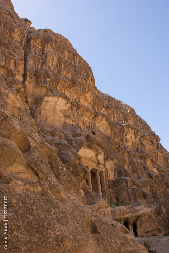 The distant ancient carved sandstone columns of Siq al Barid, Little ...
