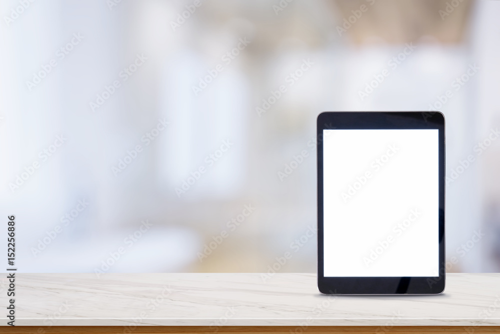 Tablet Showing blank screen on top marble table in kitchen room ...