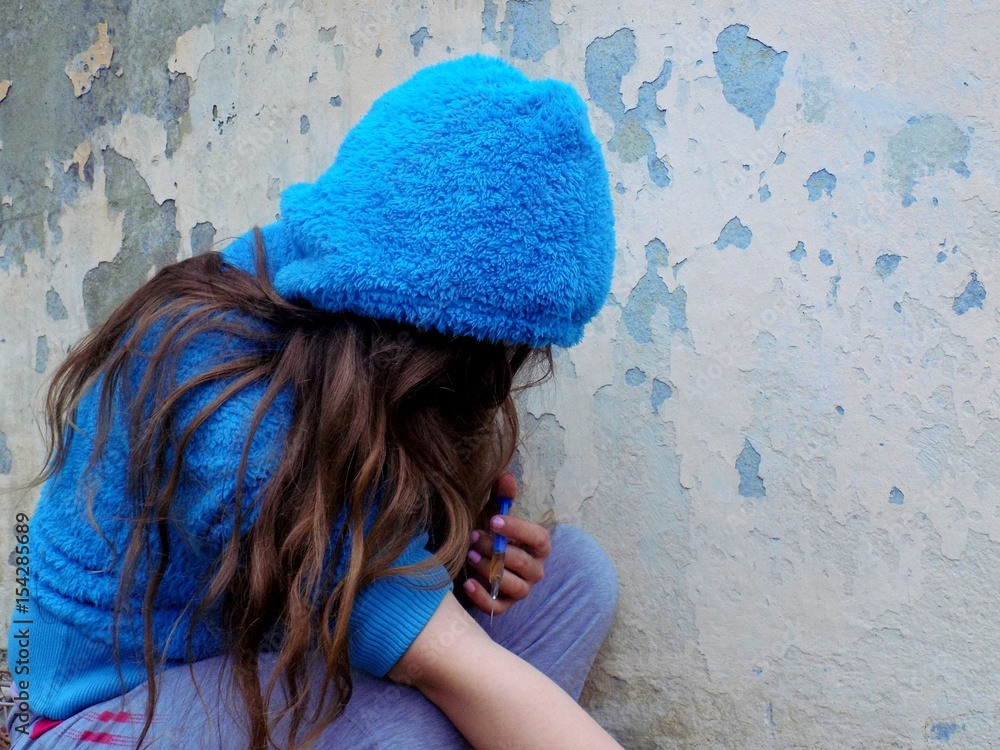 Young women use drugs in injection, young girl junkie with drug ...