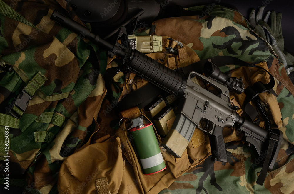 Assault rifle carbine with tactical chest rigs. Military Equipment ...