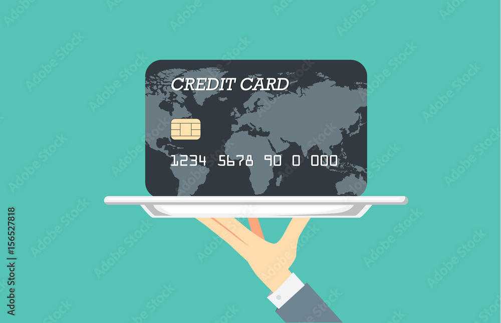 Hand holding silver tray which have black credit card paste in it ...