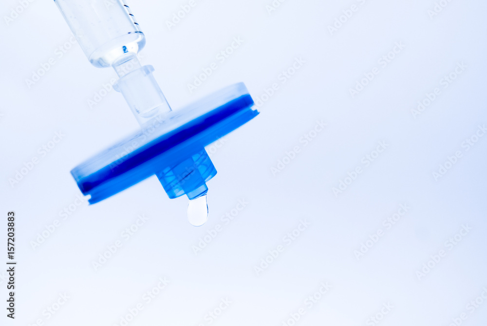 Water quality monitoring, syringe filter isolated on white background ...