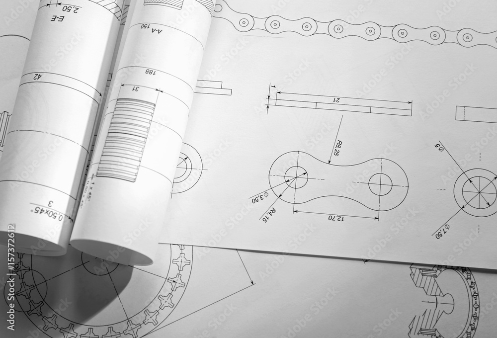 Part blueprints on engineer's workplace Stock Photo | Adobe Stock