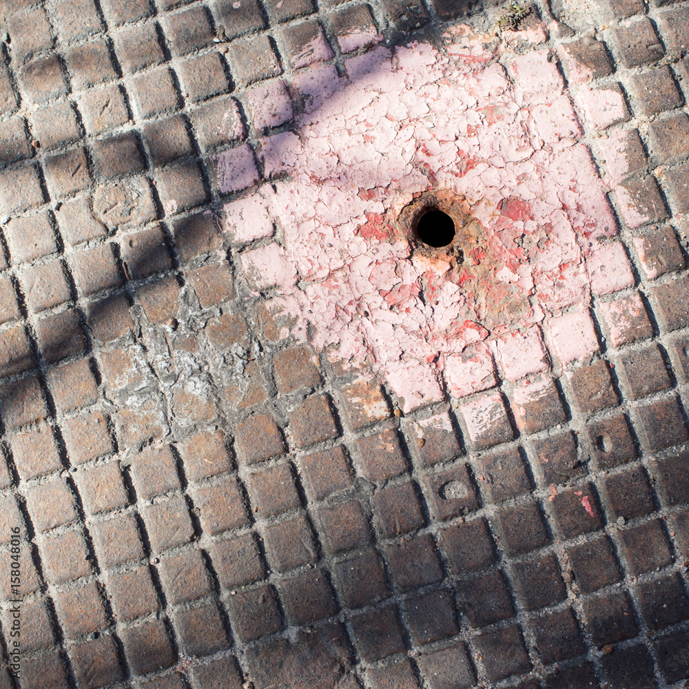 Cast-iron hatch. Relief background. Stock Photo | Adobe Stock