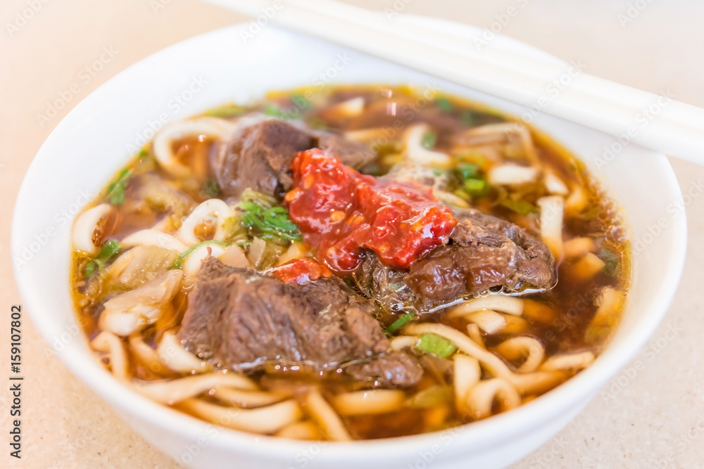 Spicy beef noodle Laksa soup which is a popular traditional spicy ...