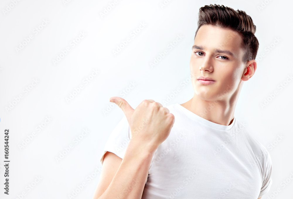 Man surprised shows on your product .Handsome guy with stylish ...