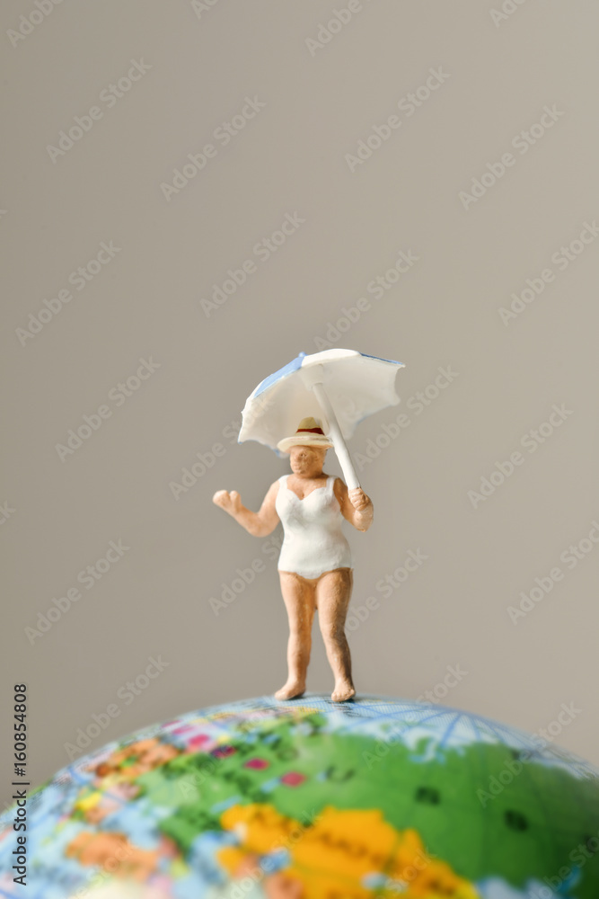 miniature woman in swimsuit Stock Photo | Adobe Stock