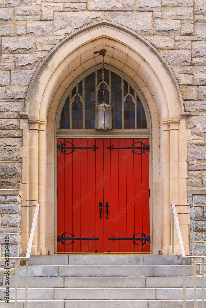 One door on the facade of Saint Mark United Methodist Church front view ...