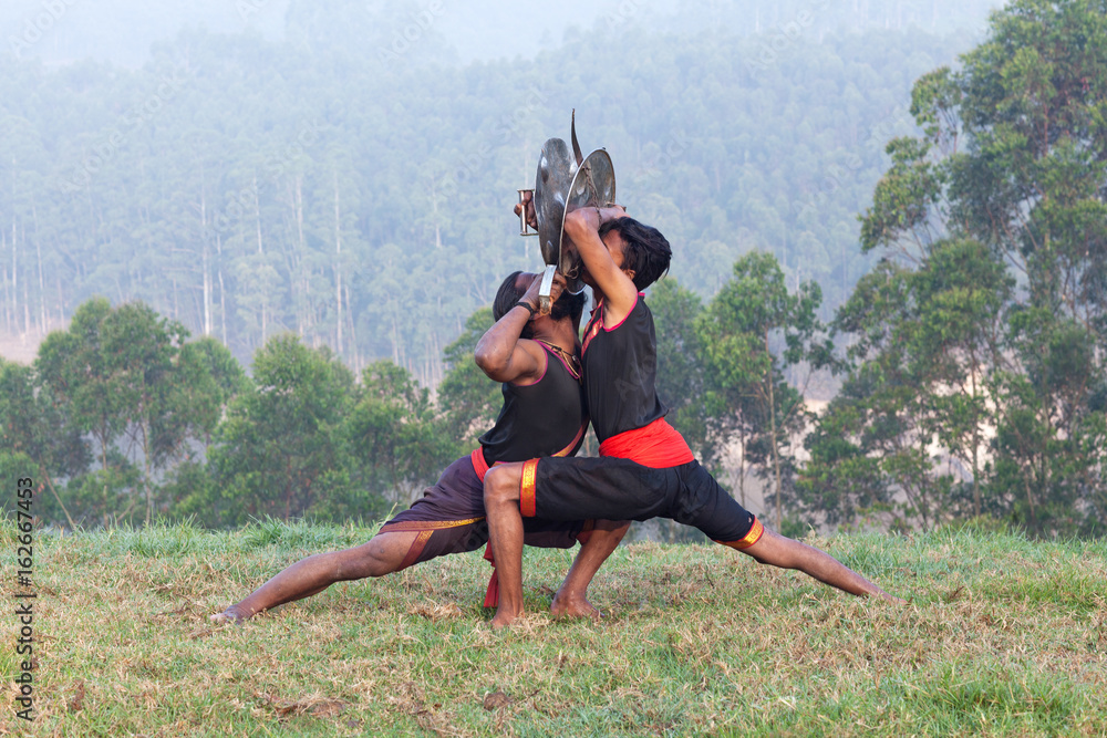 Fighters performing Weapon Combat during Kalaripayattu Marital art ...