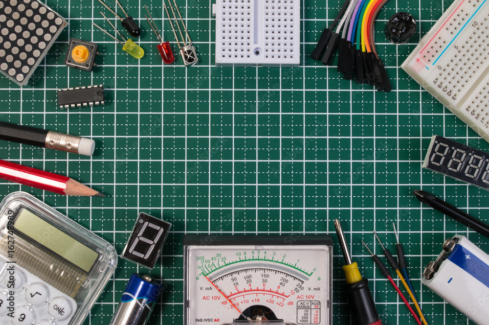 Photo Stock DIY electrical maker tools components on green cutting mat ...