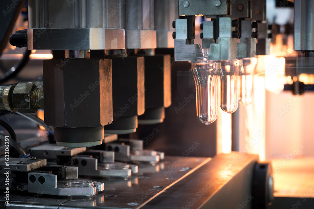 Plastic bottle making process Stock Photo | Adobe Stock