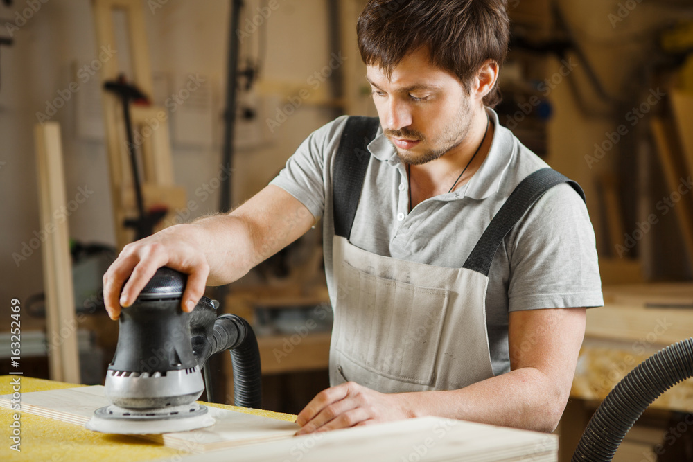Eccentric grinding machine makes wooden polishing of bar plank Stock ...
