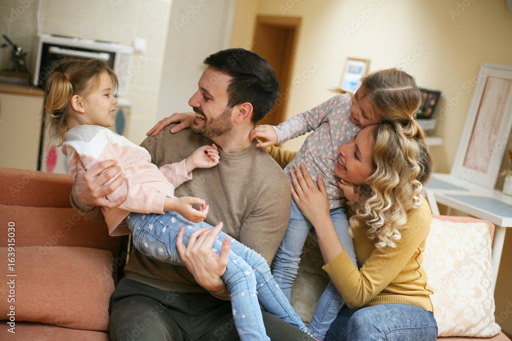 Family with two daughters. Stock Photo | Adobe Stock