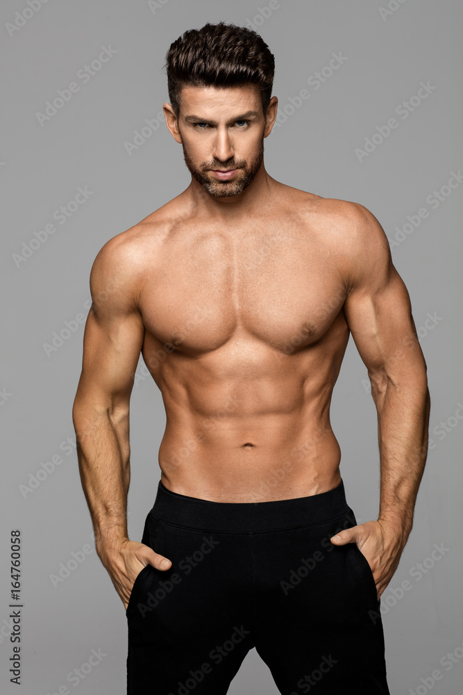 Fitness male model posing Stock Photo | Adobe Stock