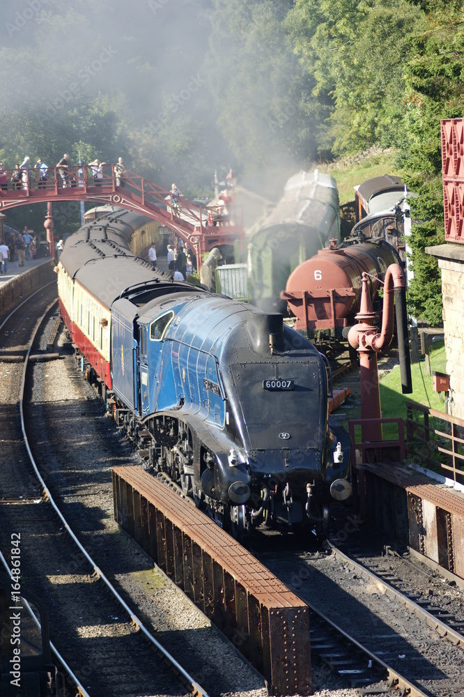 Sir Nigel Gresley Steam engine with a passenger train at Goathland ...