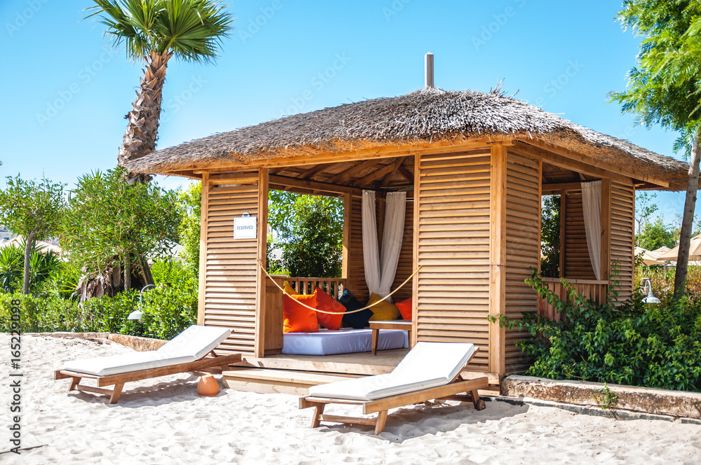 VIP bungalow on the beach for sunbathing, luxury beach resort Stock ...