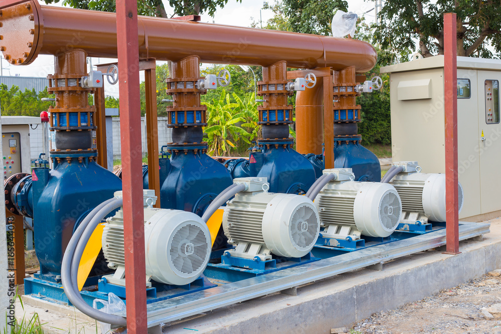Electric motors driving water pumps of waste water treatment system ...
