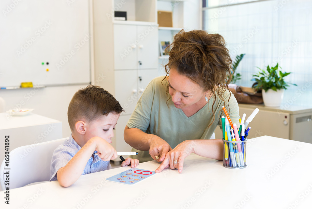 teacher woman learn to write character preschooler child boy, while ...