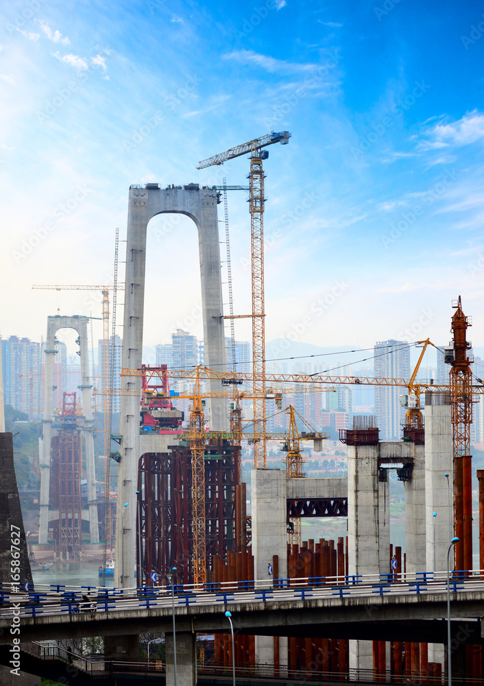 onstruction of tall concrete pylon of bridge using tower crane Stock ...