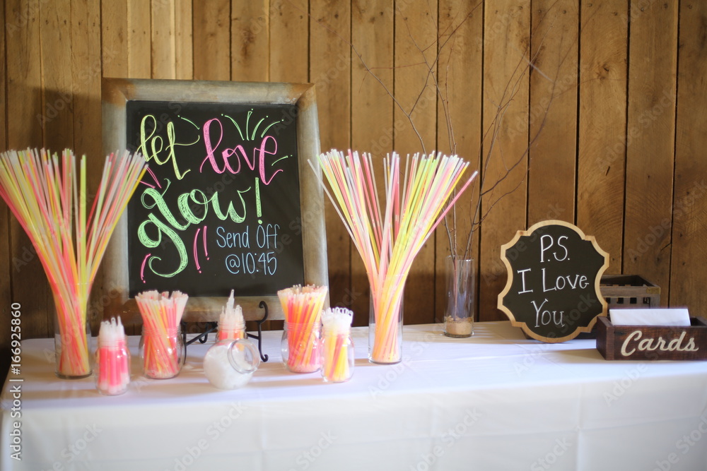 Wedding Glow Stick Send Off with a Wood Backdrop Stock Photo | Adobe Stock
