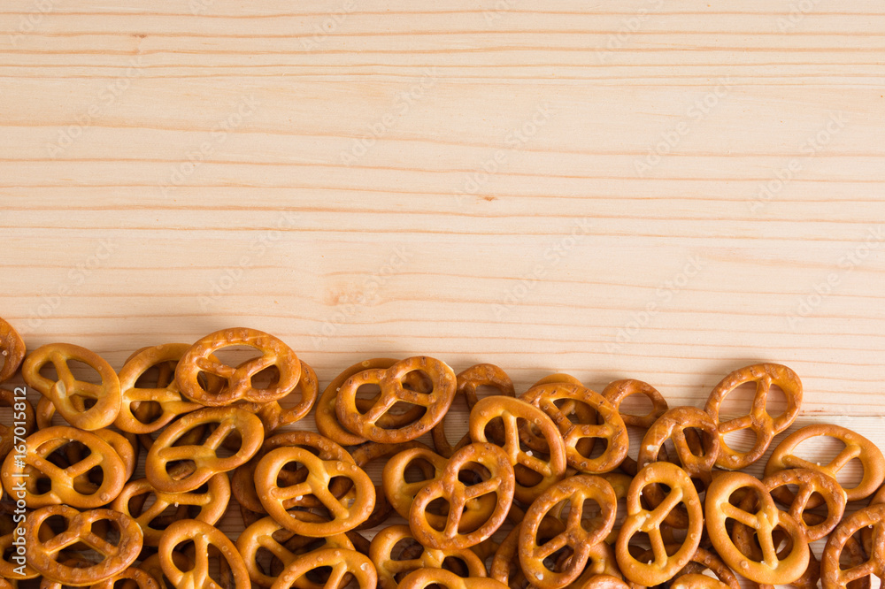 Background texture of salted savory mini pretzels in the traditional ...