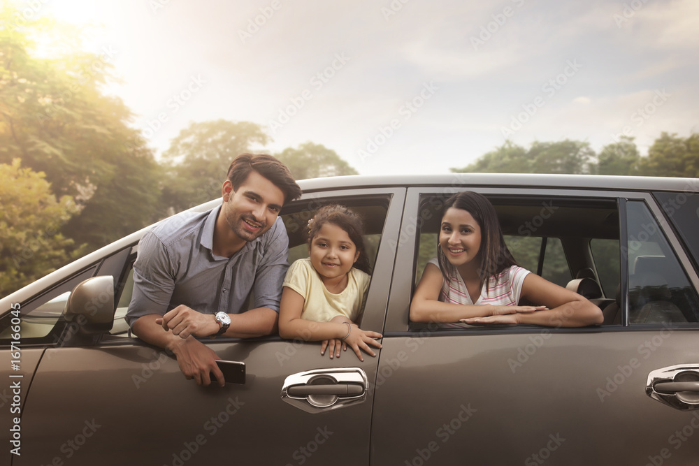 Family looking out car window Stock Photo | Adobe Stock