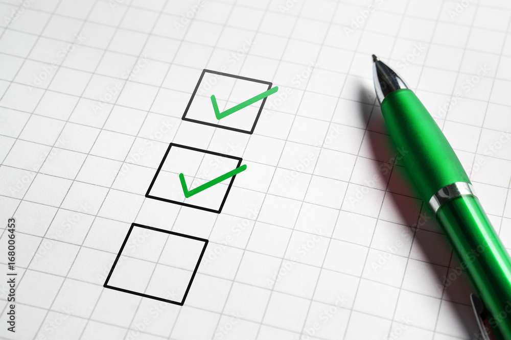Checklist and to do list with v sign check marks in square box. Pen and ...