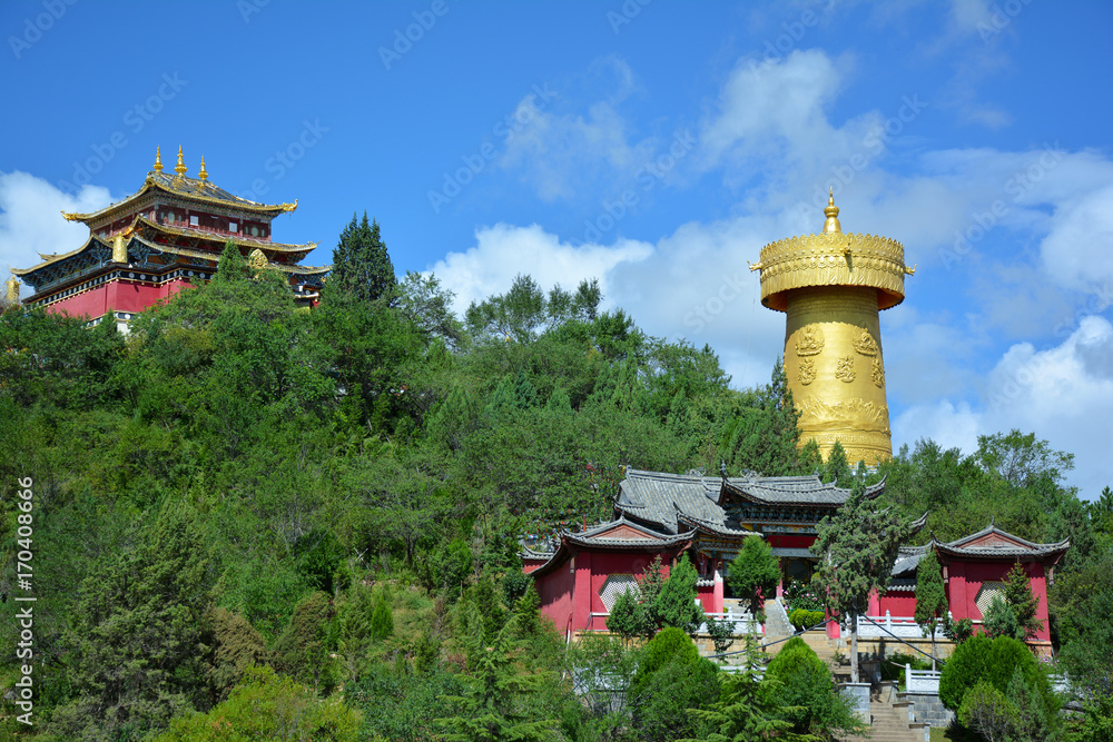 Beautiful view of the Tibetian temple and the biggest buddhist wheel in ...