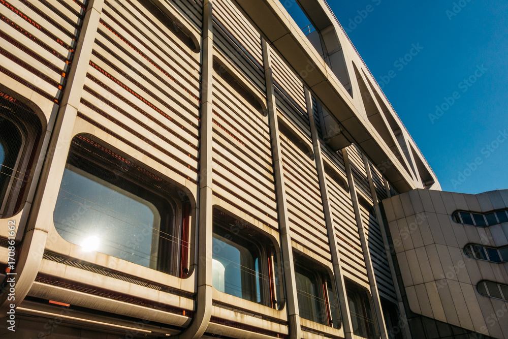 big industrial building with small lens flare in the window Stock Photo ...