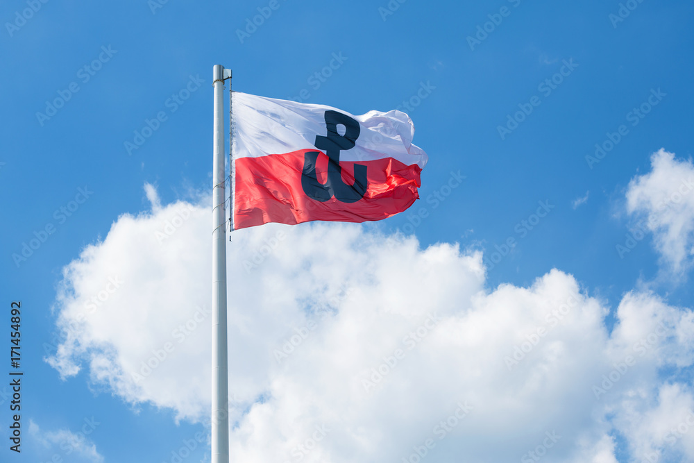 Polish flag with the symbol of Polish Fighting. Symbol of the Warsaw ...