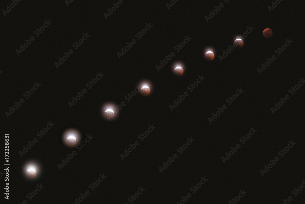 Lunar eclipse multiple exposure sequence Stock Photo | Adobe Stock