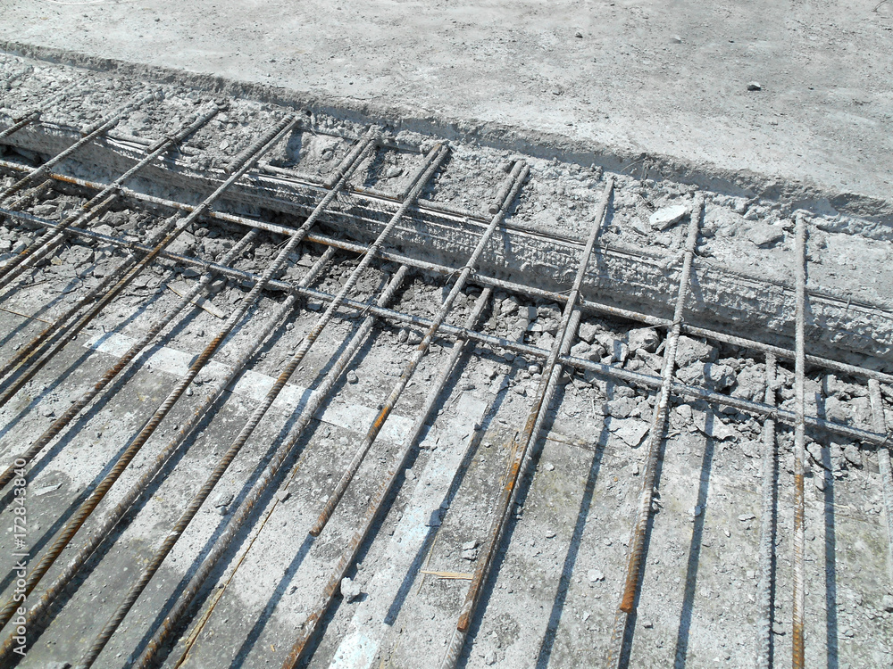 Concrete construction joint at construction site. Wire mesh used to ...