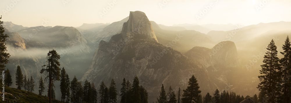 Magical morning sunshine and fog rises over Glacier Point at Yosemite ...