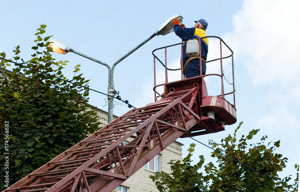 Repair street lighting Stock Photo | Adobe Stock