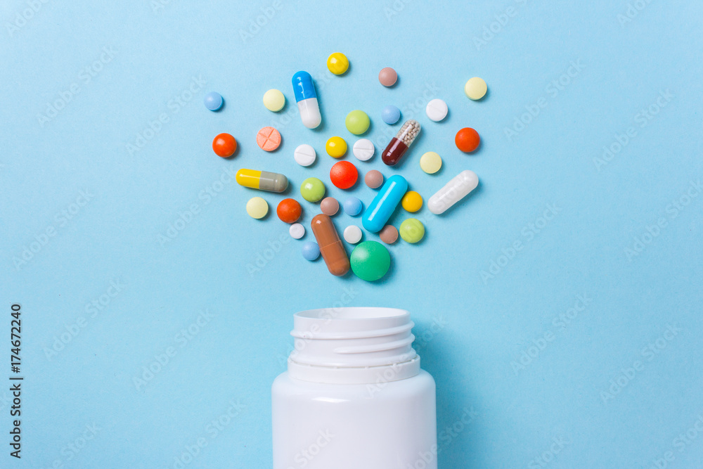 Assorted pharmaceutical medicine pills, tablets and capsules and bottle ...