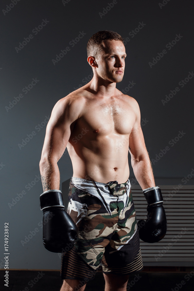 handsome man or healthy boxer or Thai boxer with six pack wearing ...