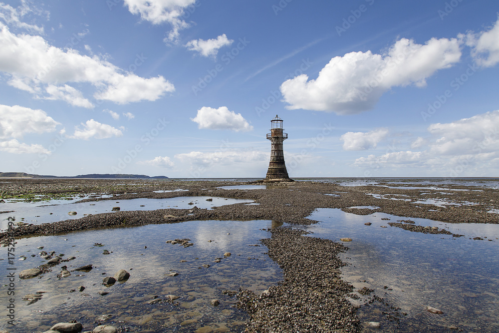 Whiteford Lighthouse is listed by Cadw as Grade II* A wave-swept cast ...