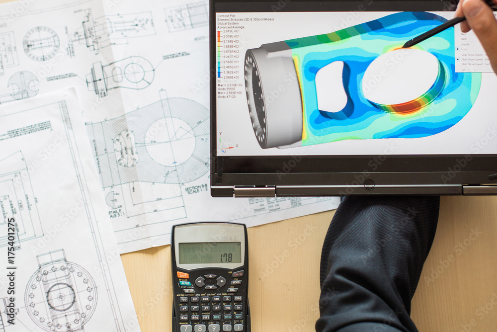 Engineering of industrial component with blueprints Stock Photo | Adobe ...